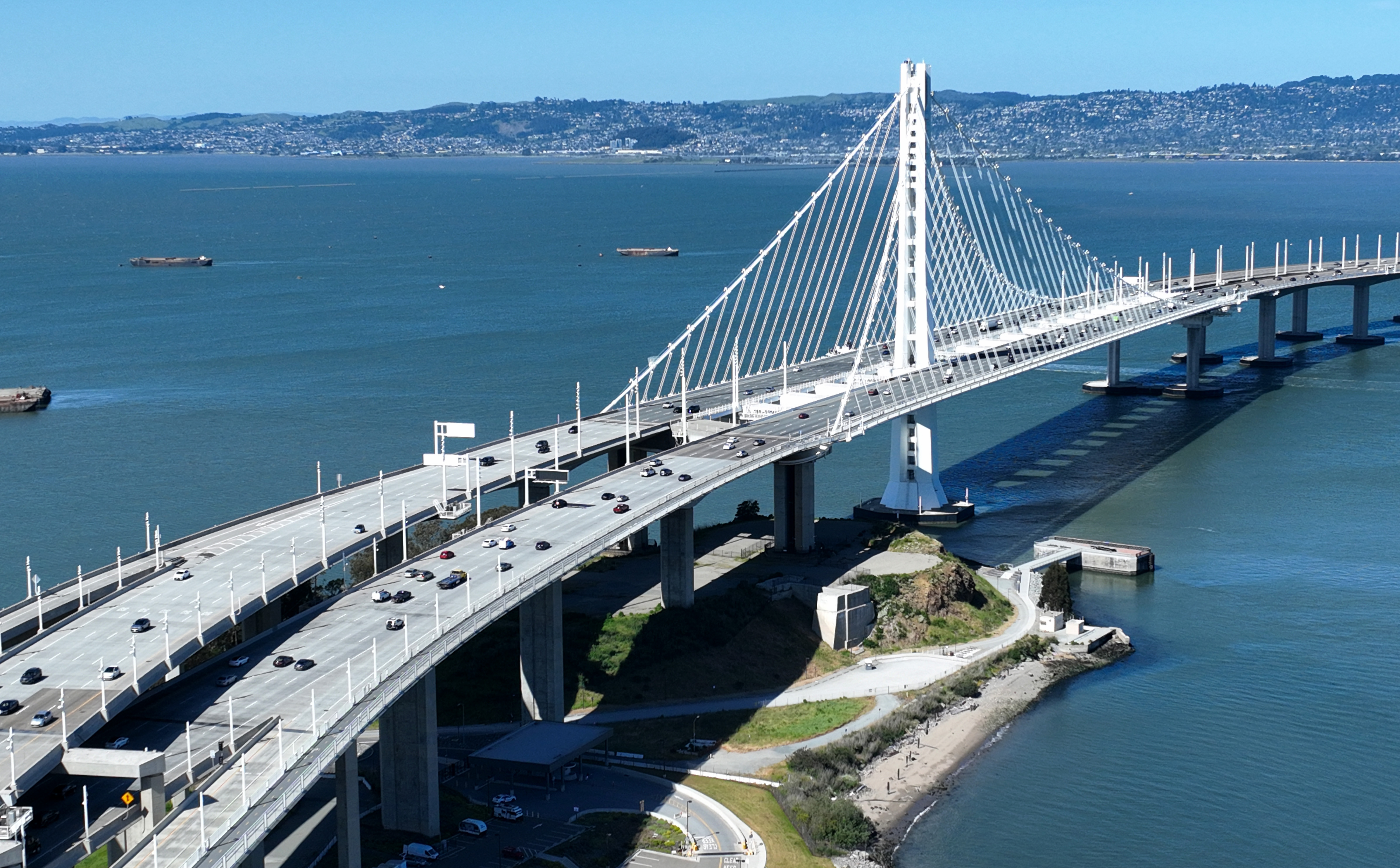 The eastbound lanes of the Bay Bridge are now open again after a grass ...